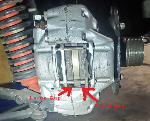 Front brake disk scraping on caliper during right turns - Elan ...